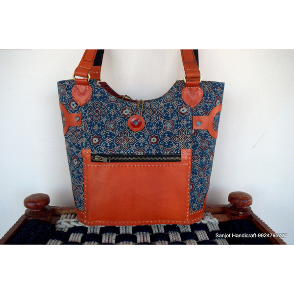 Leather handbag with Ajrakh block print fabric - directcreate.com